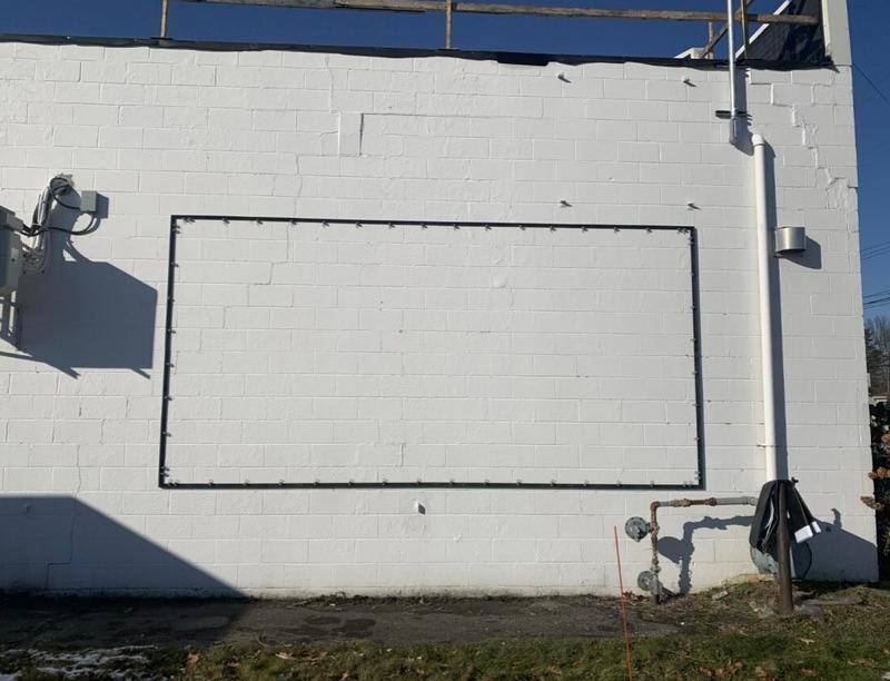 Banner Frame Installation: 40 Years of Comfort | Lind SignSpring